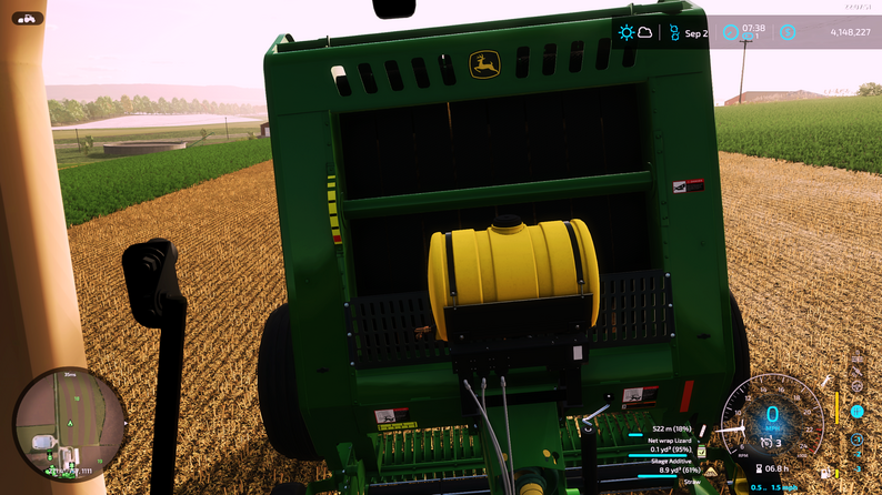 FS22 John Deere 560M with Net Wrap Addon by Cunningham Modding