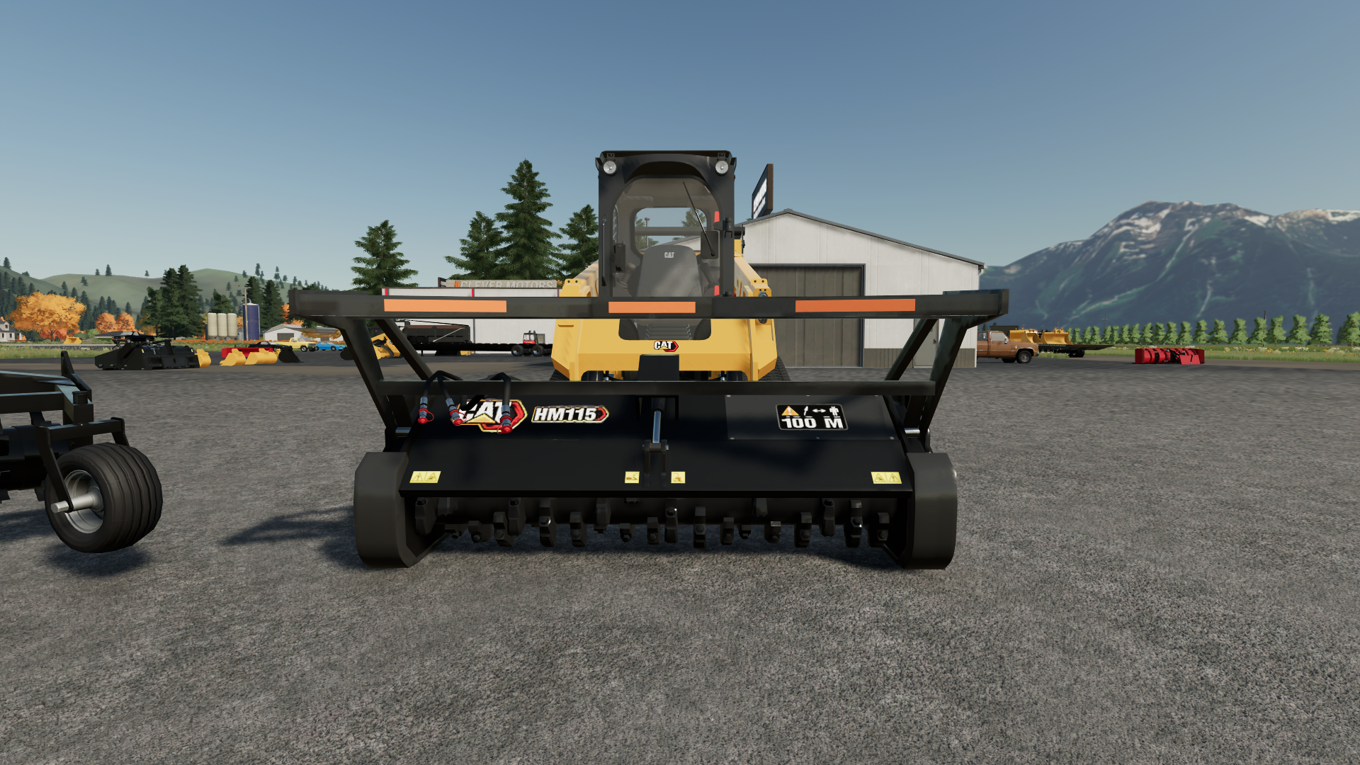 Cat HM115 Mulcher by The Ontario Landscaper