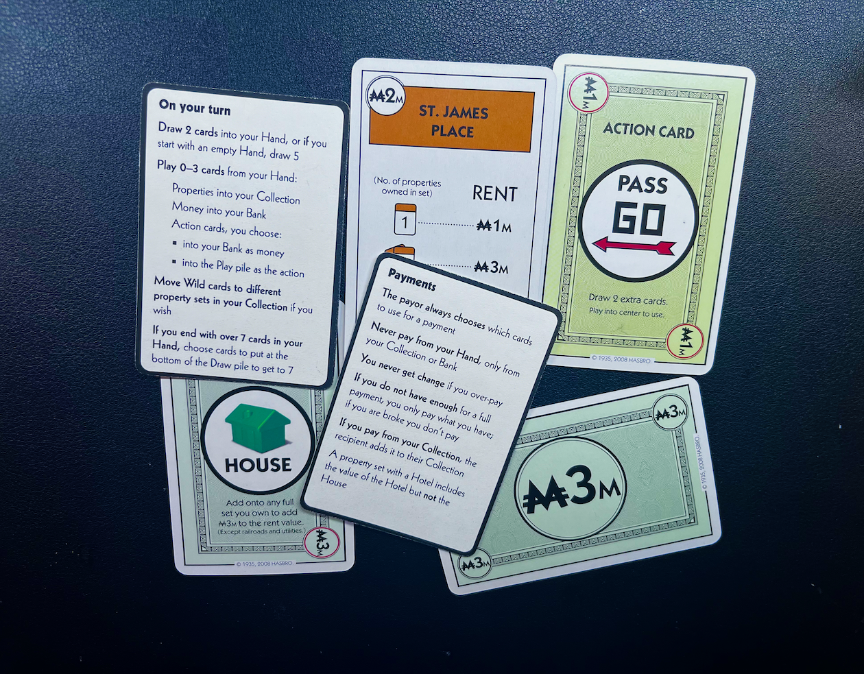 Monopoly Deal rule cards by Jonathan Korman