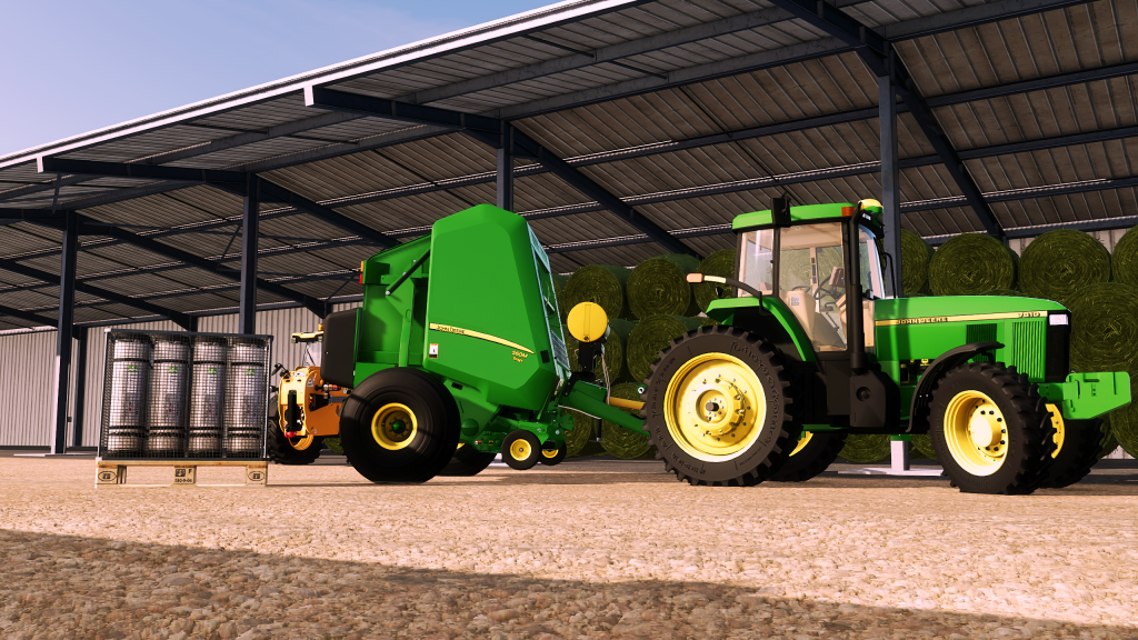 FS22 John Deere 560M with Net Wrap Addon by Cunningham Modding